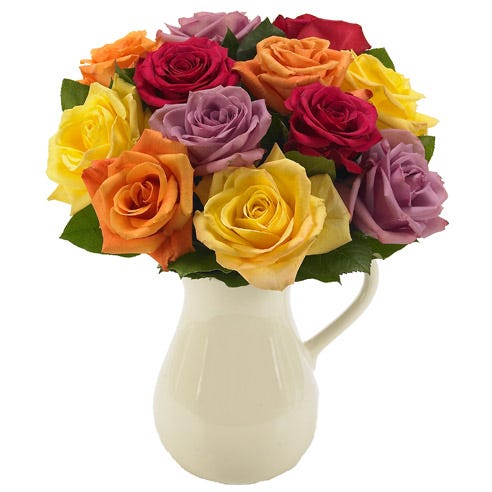 Classic Multi-colored Roses in a Pitcher at Send Flowers