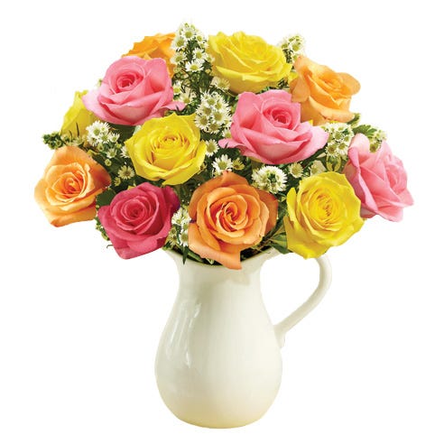Mixed Spring Roses in a Pitcher at Send Flowers