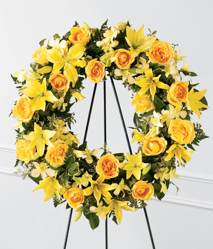 Rose And Lily Wreath Standing Spray at Send Flowers